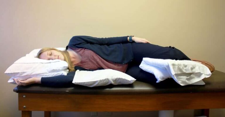 The best position to sit and sleep after spine surgery for recovery.